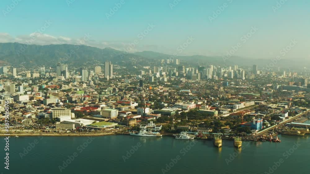 Cityscape: Cebu city with modern buildings, skyscrapers and seaport ...