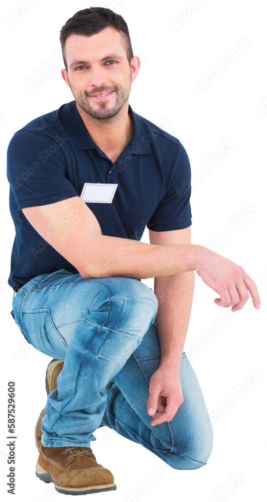Portrait of happy man kneeling Stock Photo | Adobe Stock