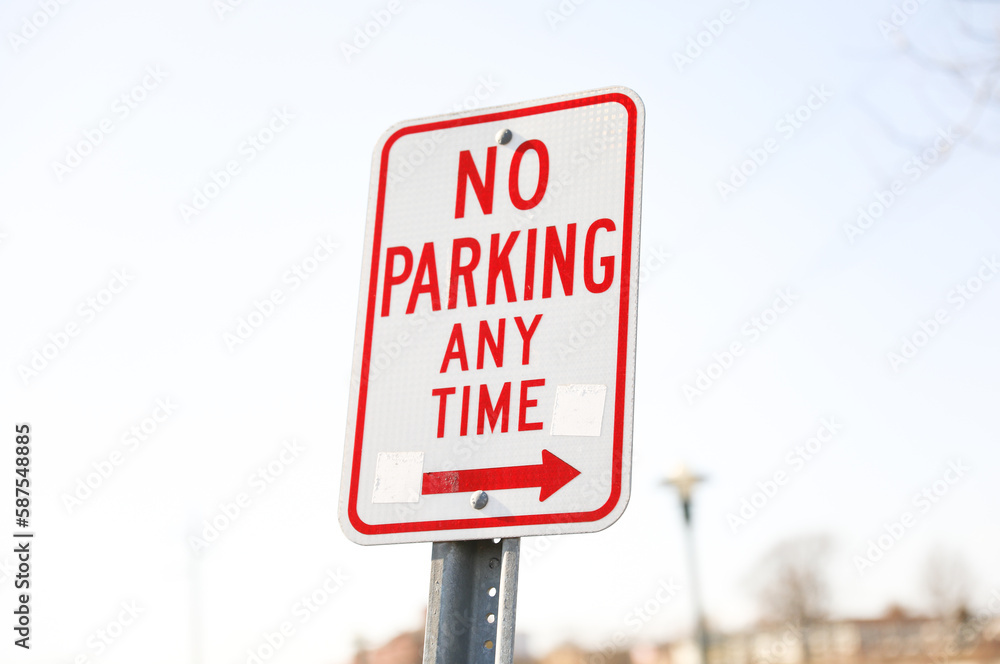 Foto de No parking signs symbolize restricted parking zones to ensure ...