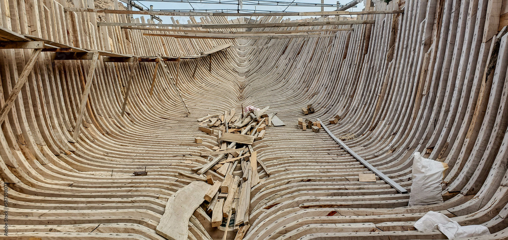 Interior of a giant traditional dhow Al Ghanja in the shipbuilding ...