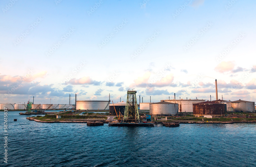 Oil harbor. Refinery and oil storage on the shore of the Gulf of ...