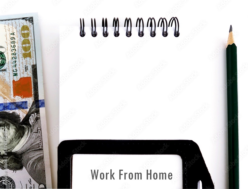 Dollars money , notebook, a pencil and ID card with text written WORK ...