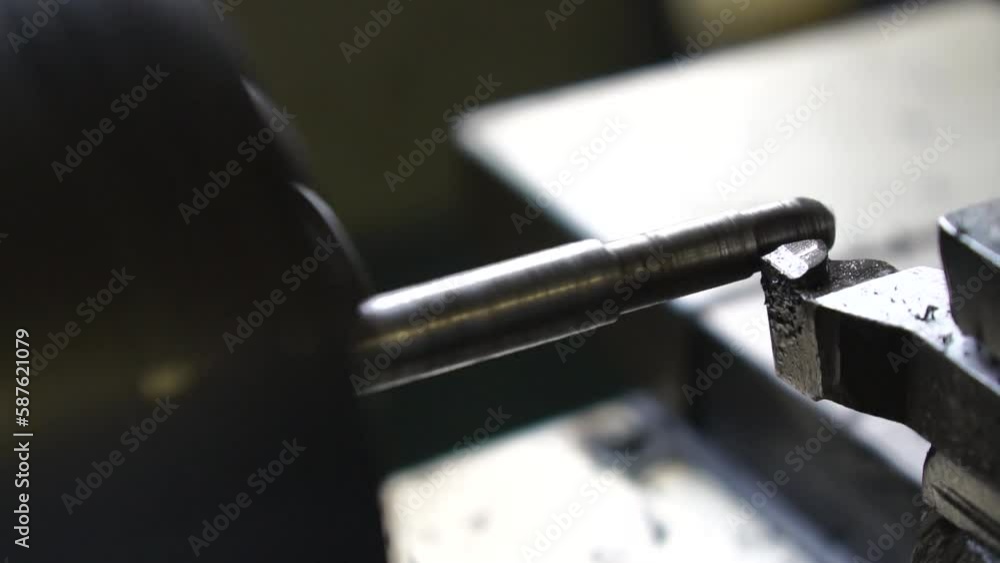 Close-up lathe machine operation by cutting the metal tube. vintage ...
