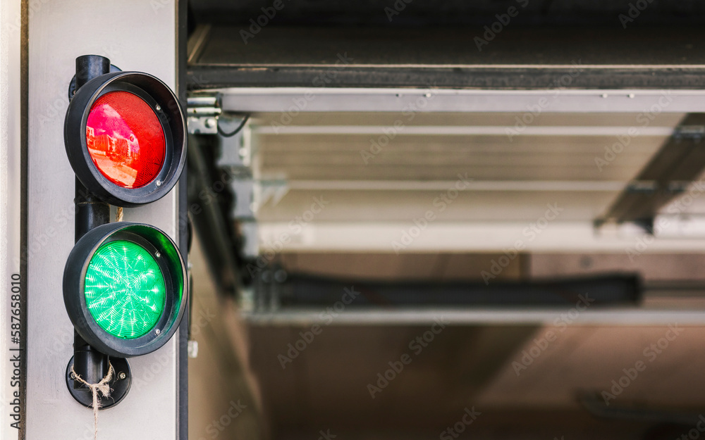 Traffic Light with Red and Green Lights is Front of Garage Door ...