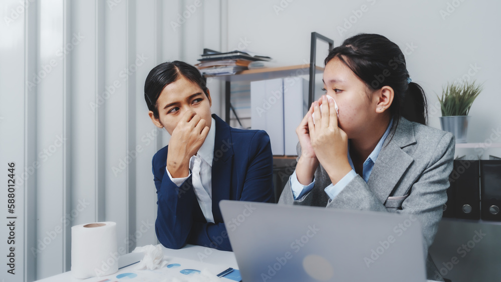 Young pretty asian business woman with friends having covid and sinus ...