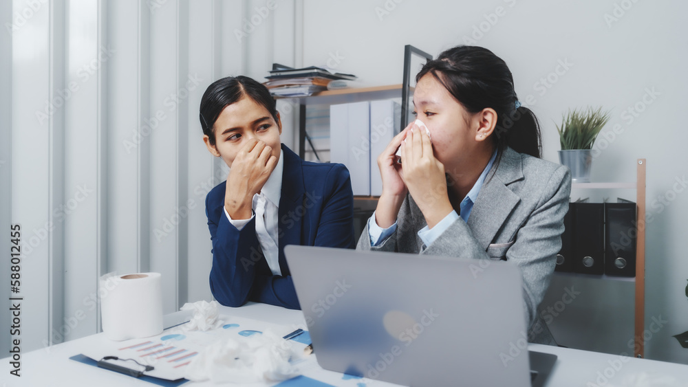 Young pretty asian business woman with friends having covid and sinus ...