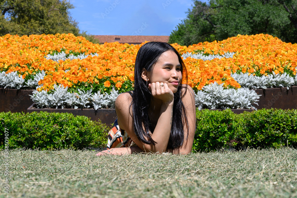 Young attractive Asian American college student, with her graduation ...