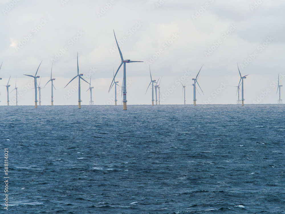 Fotka „Offshore and Onshore Windmill farm Westermeerwind, Windmill park ...