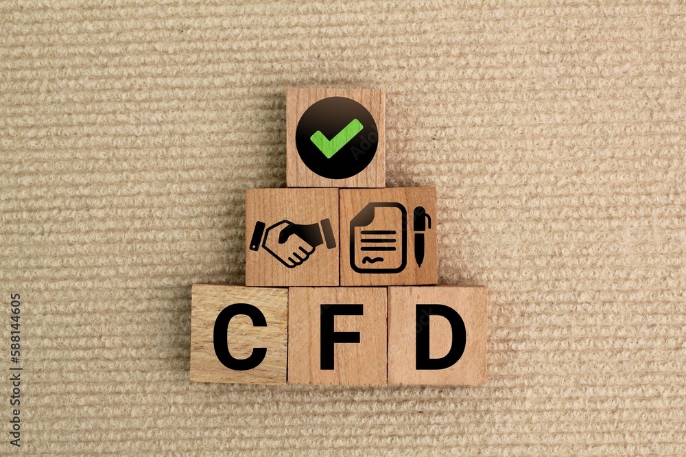 wooden square with icon and word contract for difference or CFD letters ...