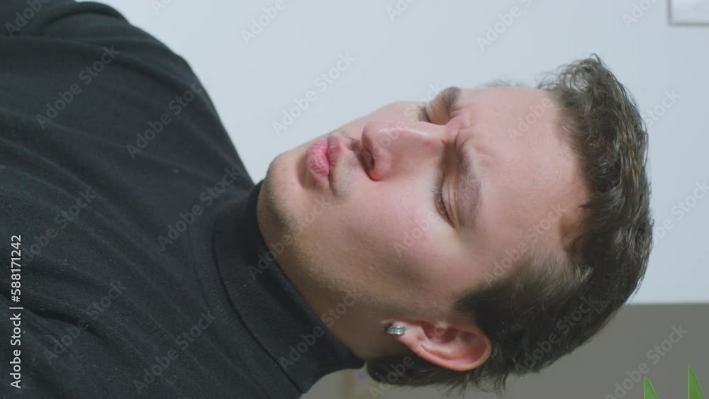 Man black turtleneck makes different facial expressions grimaces ...