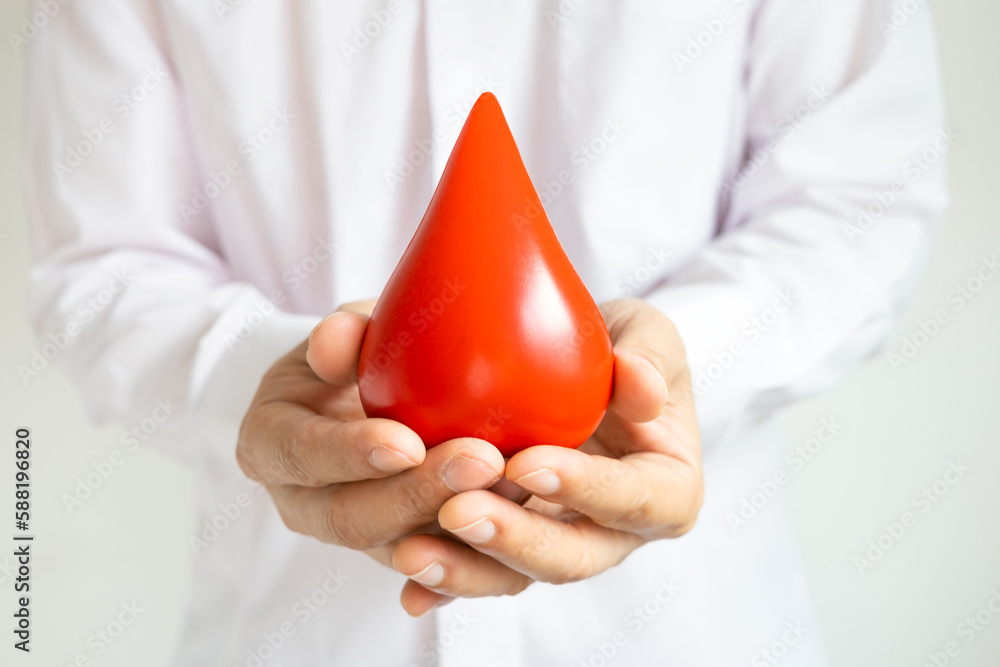 healthy man's hand holding blood symbol Blood Donation Help and Health ...