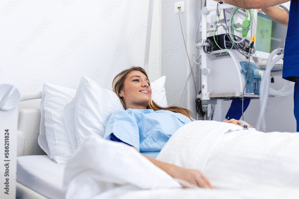 Young woman laying on bed at hospital ward. medicine, health care and ...