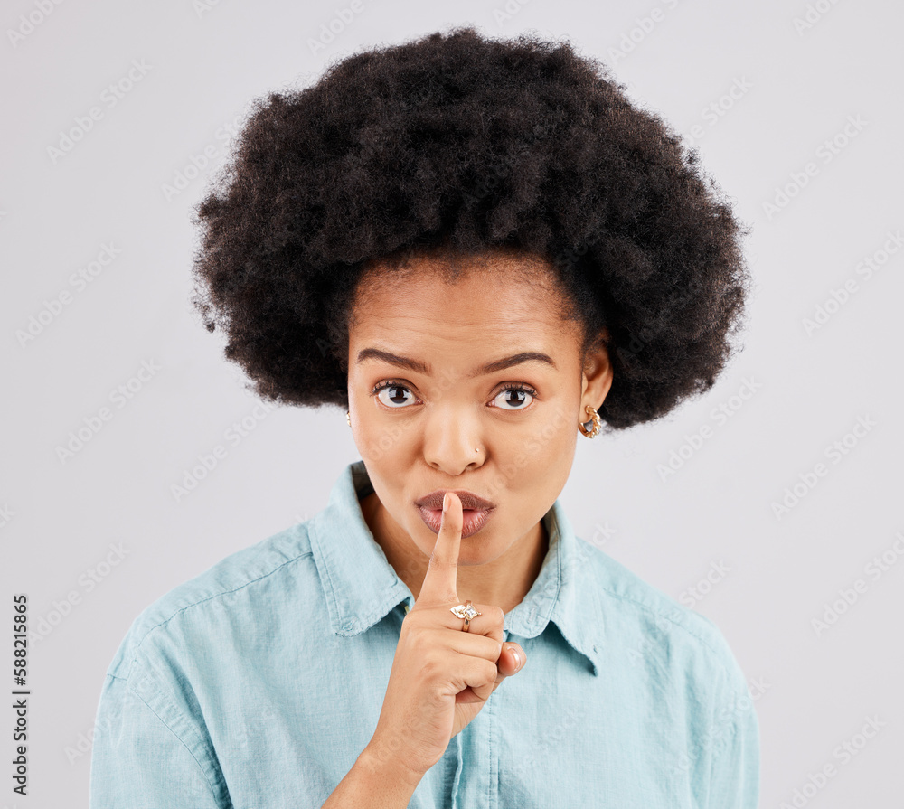 Secret, portrait and woman with finger on lips in studio, white ...