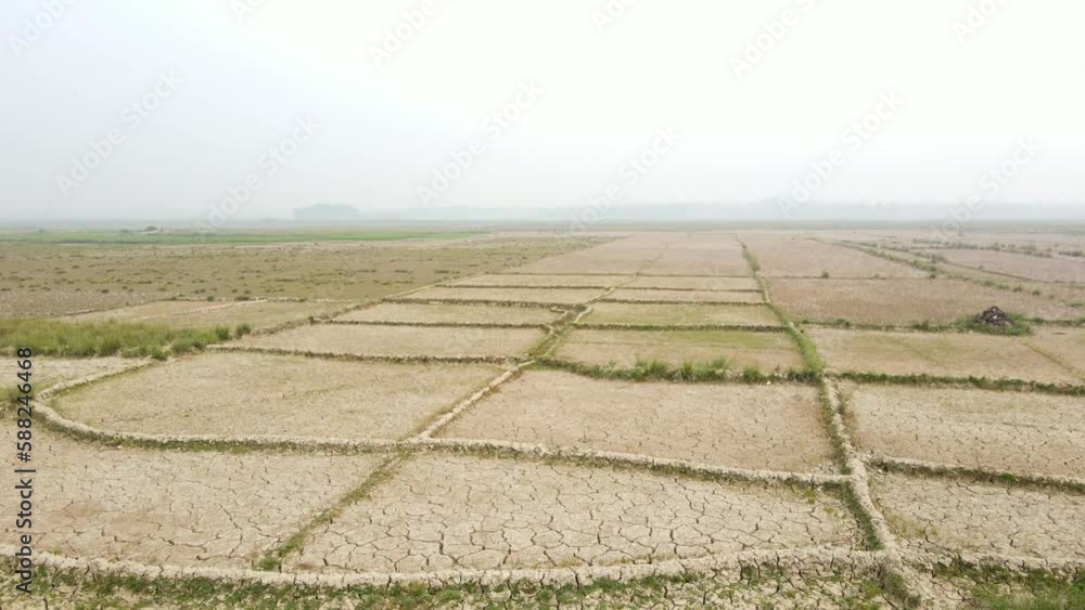 An aerial view of arid drought farmland on a farm in Bangladesh ...