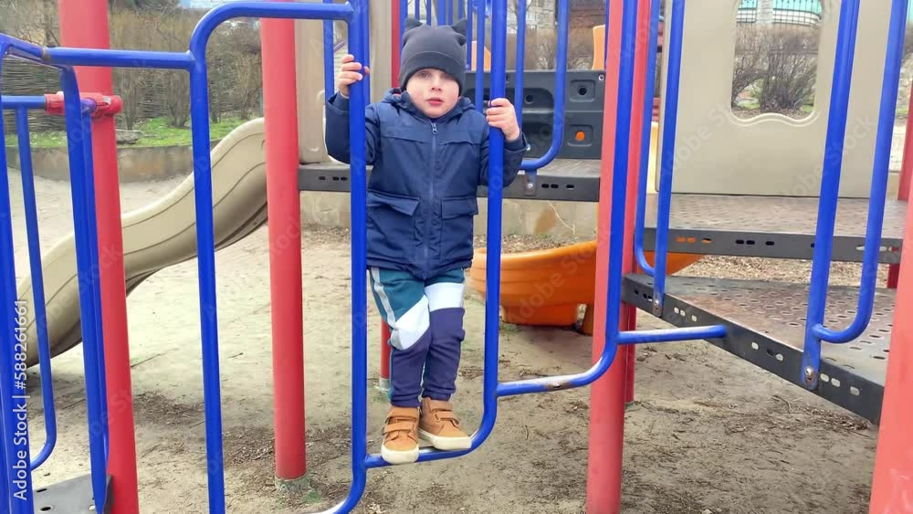 Cute funny little toddler kid child boy having fun leisure games ...