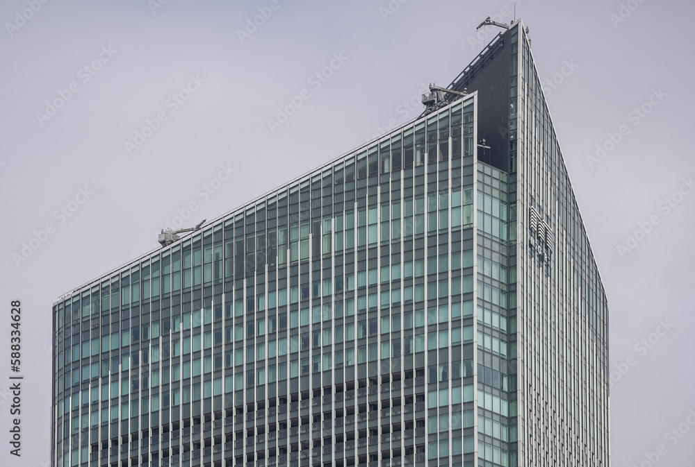 The logo sign of Mori Building Group corporation on top of the ...