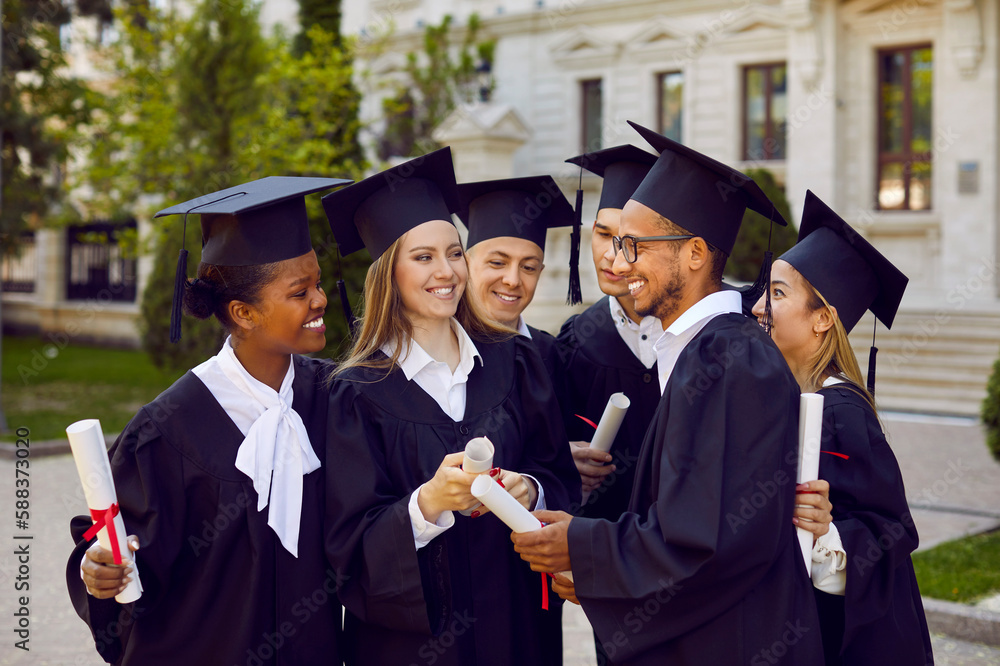 Success team of alumni communicate next to university building after ...