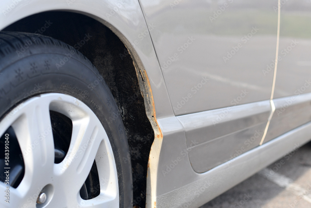 Signs of car corrosion or rust appearing on the rear arches of the car ...