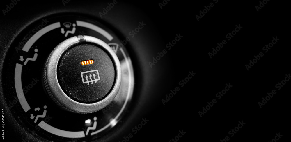 Defrost Button in Car With Orange Light On Black Background Stock Photo ...