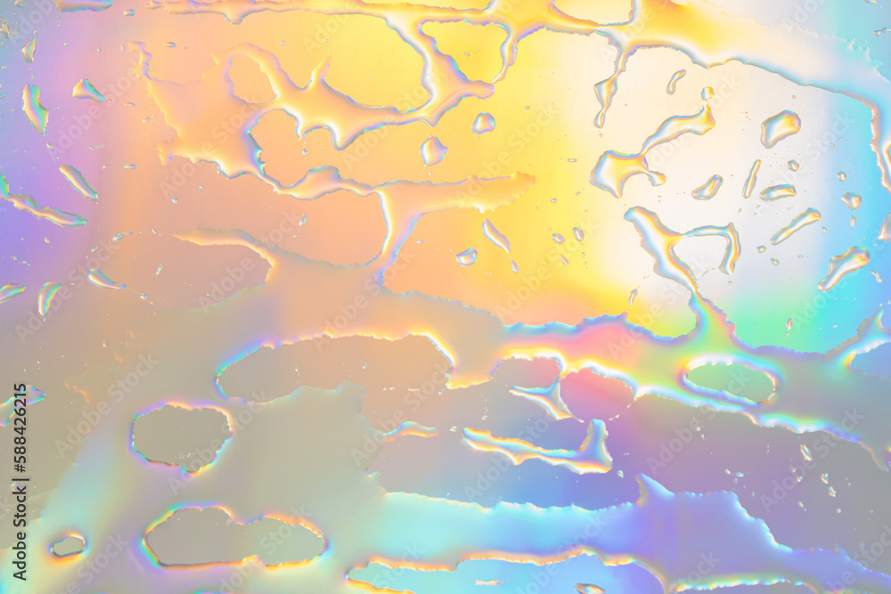 Blurred defocused abstract iridescent foil wallpaper texture. Holographic soft pastel colors ...