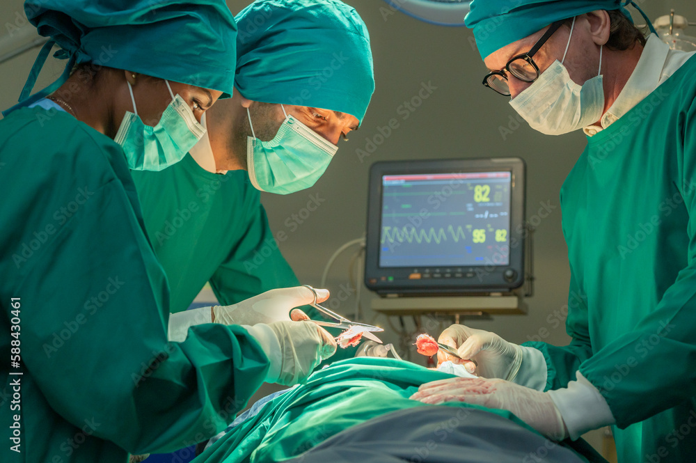 Foto de Team of surgery doctor in Operating Room, Assistant Hands out ...