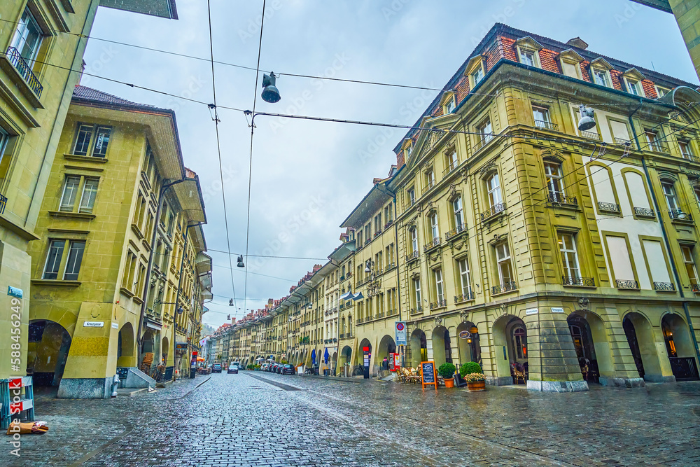 The stunning historic buildings in typical Bernese style with arcades ...