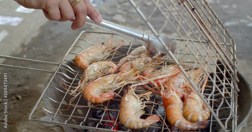 The Giant Freshwater Shrimp grill.The orange prawns are grilled over ...