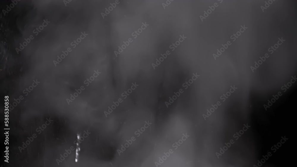 Falling Stream of Splashes on a Rising Cloud of Water Vapor on Black ...