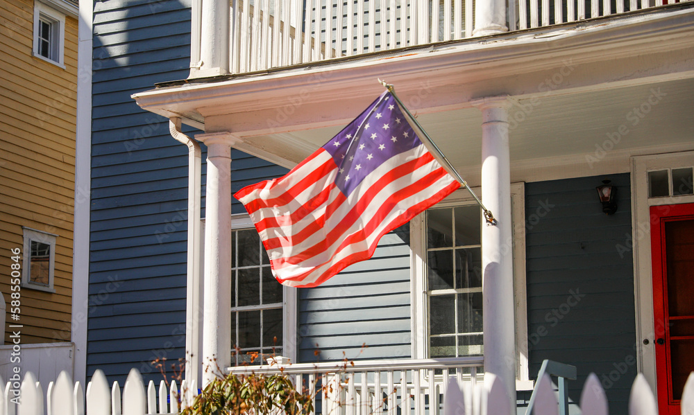 The US flag on a pole is a symbol of patriotism and unity, representing ...