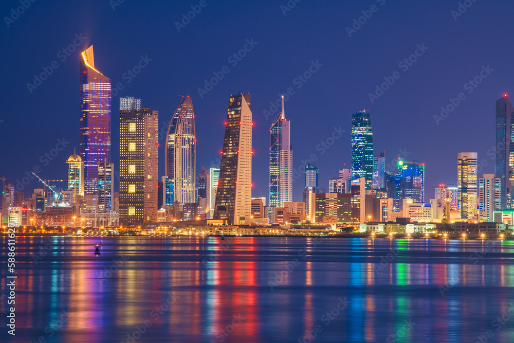 Kuwait Skyline view from beach during the national day celebration ...