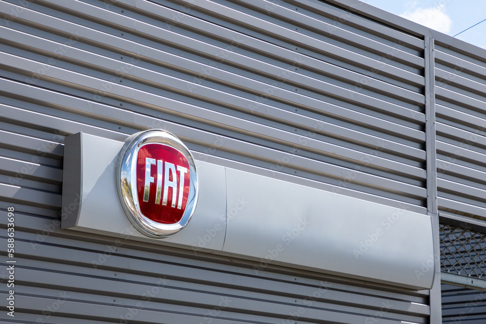 Fiat logo sign car store showroom dealership text brand on station ...
