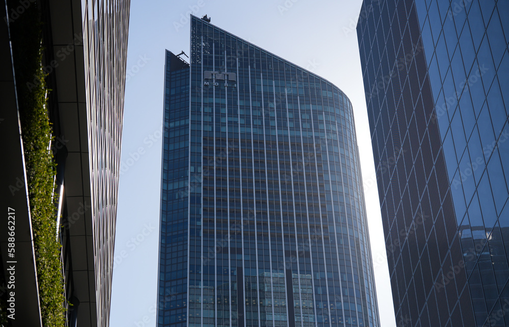 The logo sign of Mori Building Group corporation on top of the ...