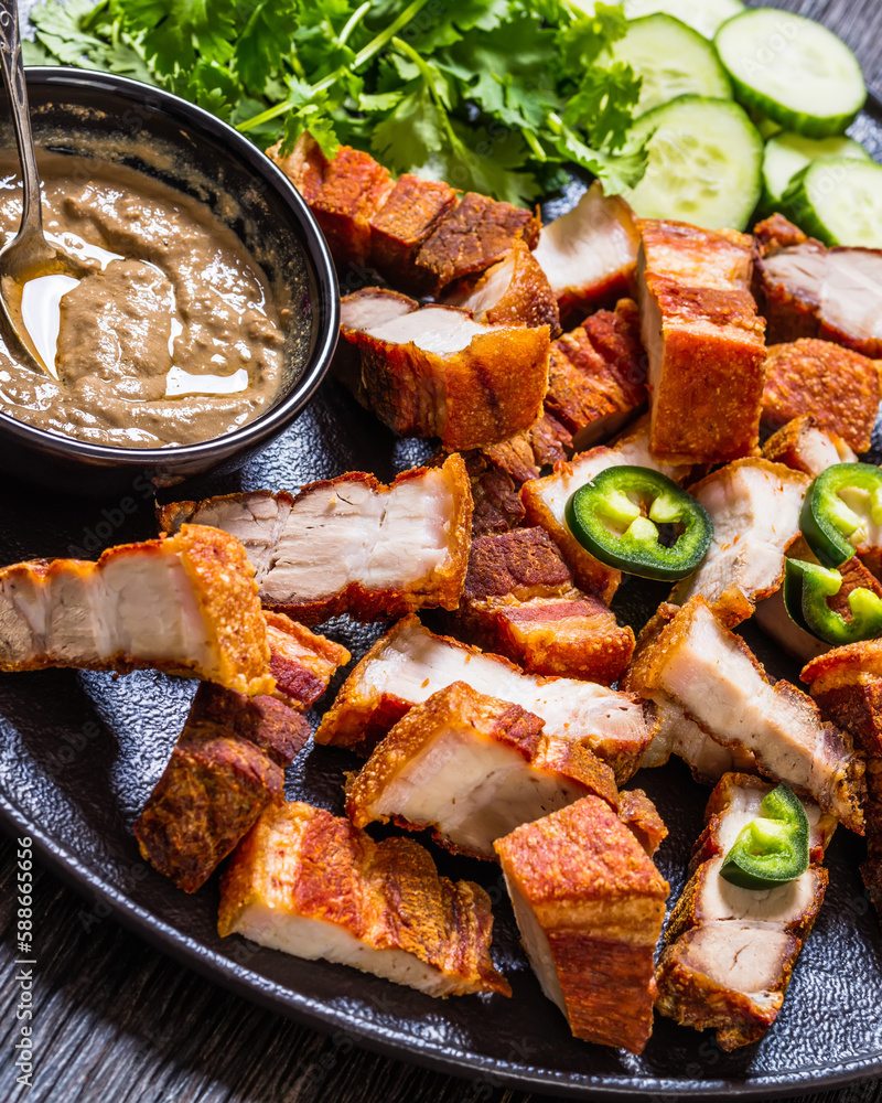 Lechon Kawali, filipino crispy fried pork belly Stock Photo | Adobe Stock
