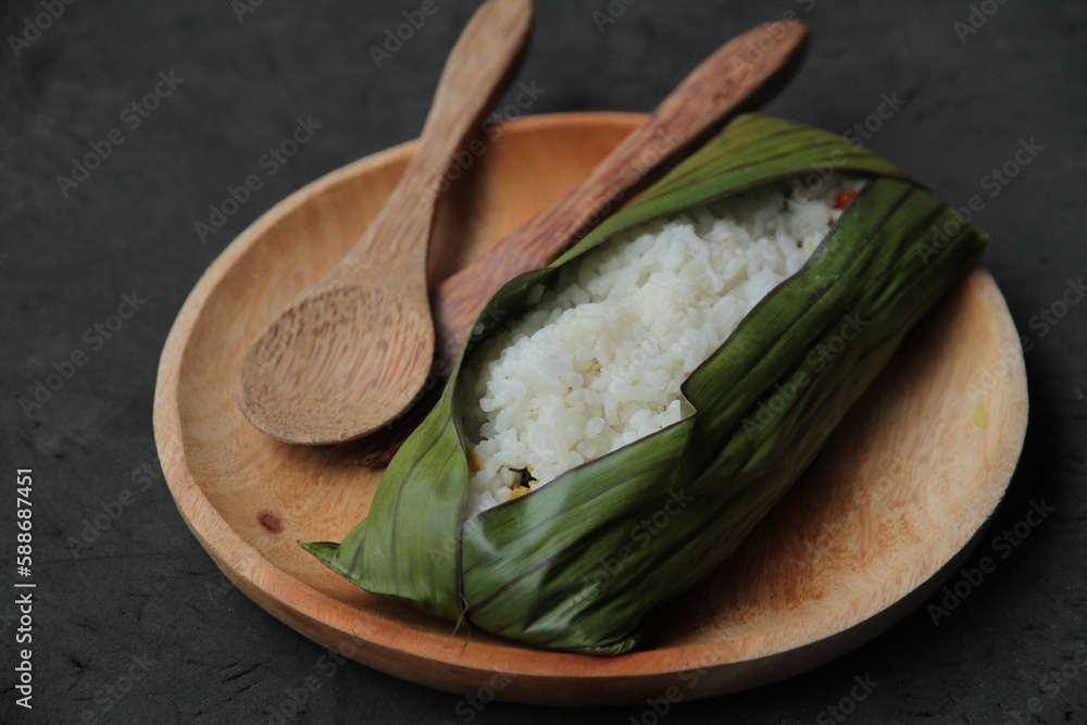 Nasi bakar (Indonesian for "burned or grilled rice") refer to steamed ...