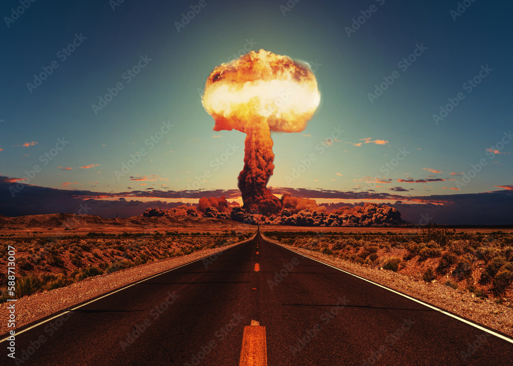 Asphalt road goes to a nuclear explosion. Terrible atomic explosion of a nuclear bomb with a ...