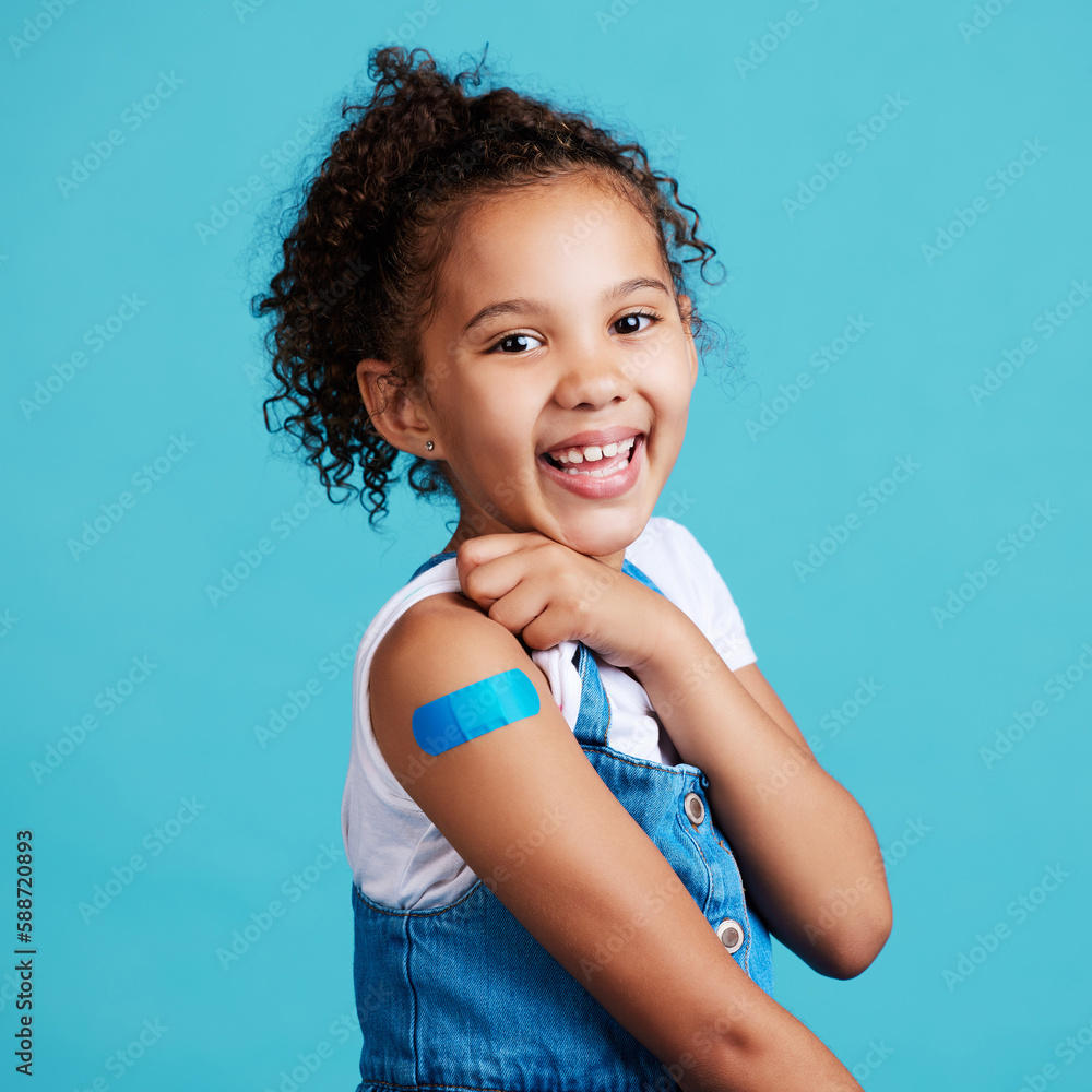 Portrait, smile and girl with plaster, wellness and safety with kid ...