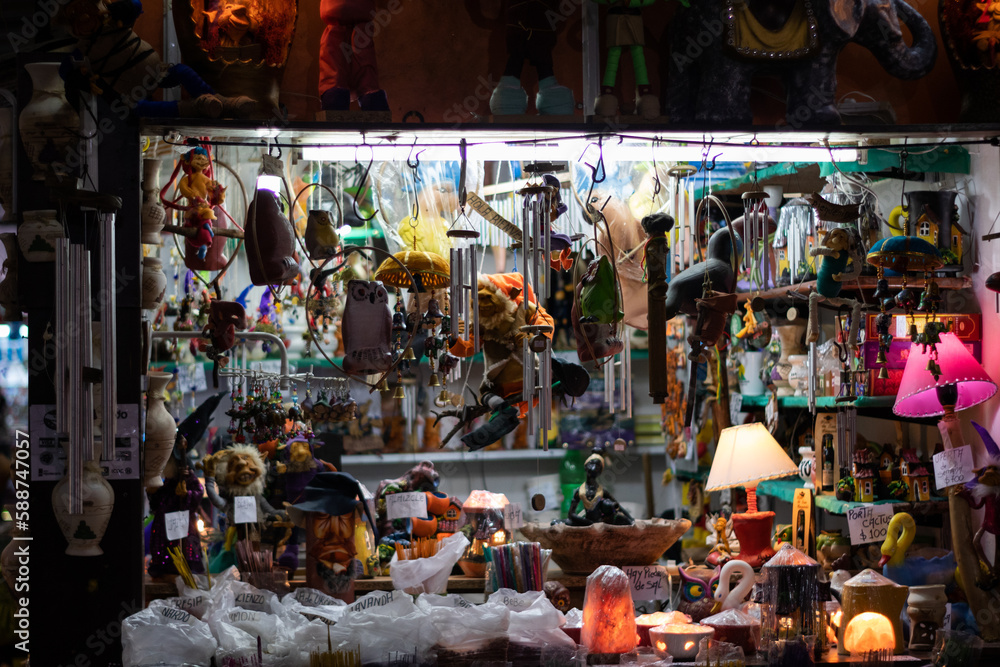 In the foreground, there is an outdoor gift shop with a wide variety of ...