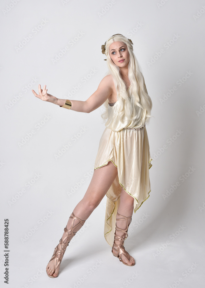 Full length portrait of beautiful blonde woman wearing a fantasy ...