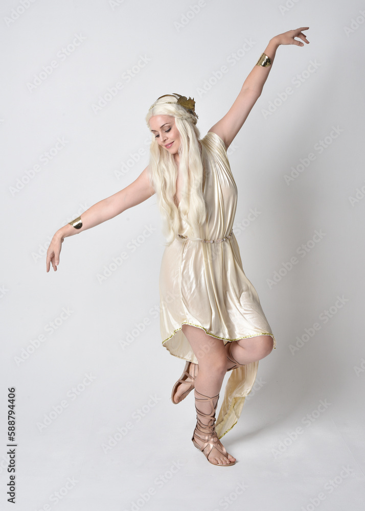 Full length portrait of beautiful blonde woman wearing a fantasy ...