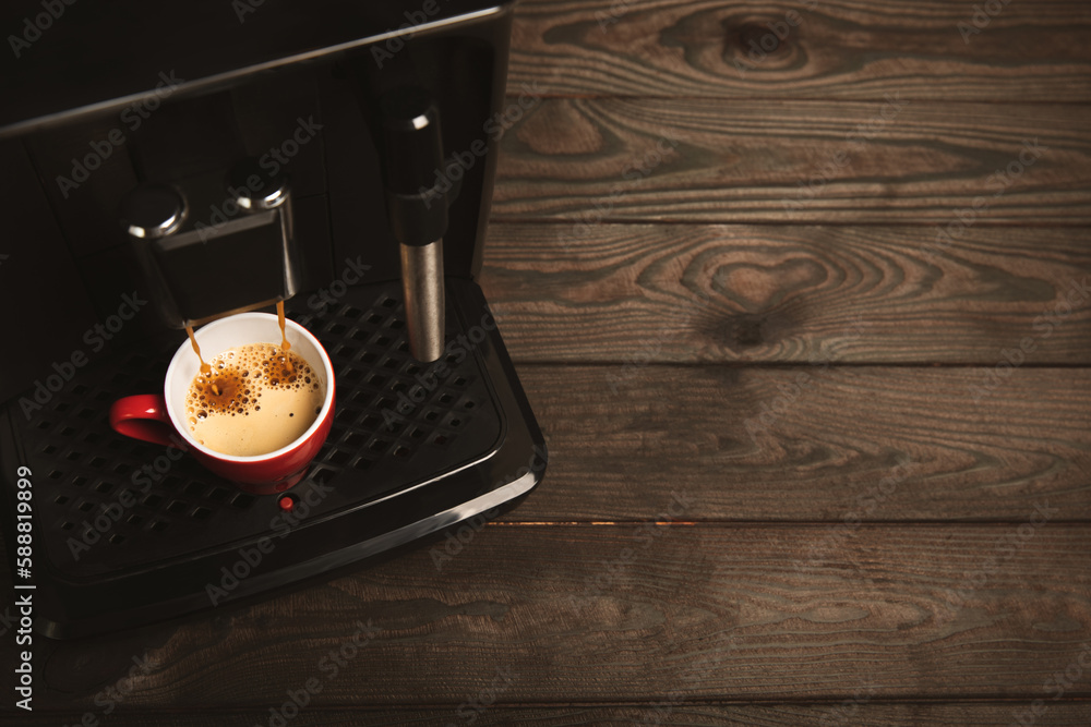 Coffee machine in modern kitchen interior. Fresh black aromatic coffee ...