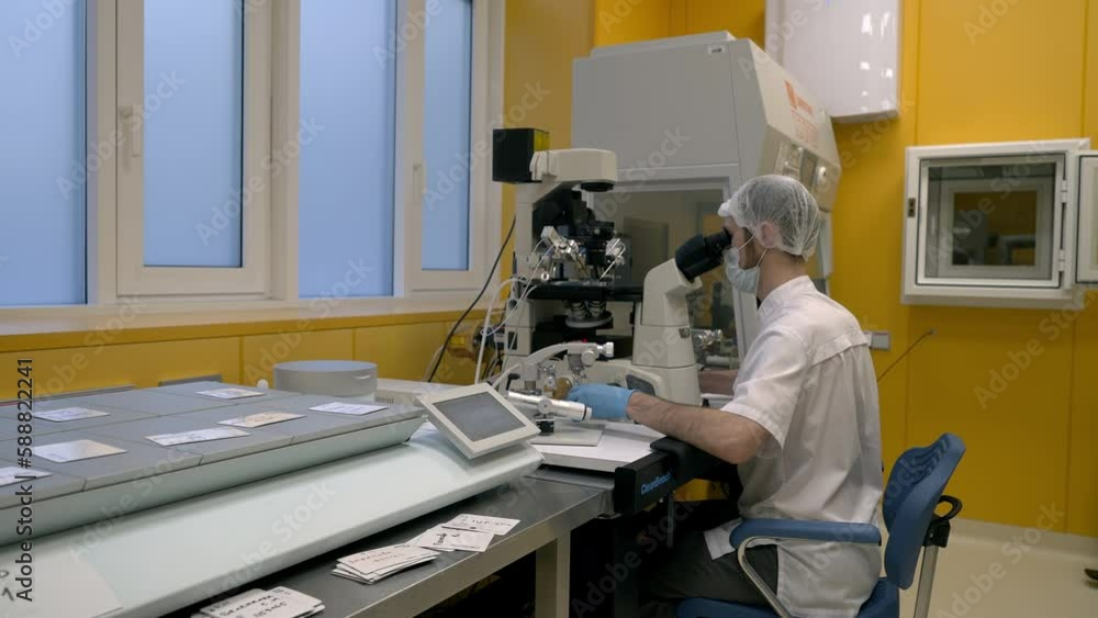Doctor performing scientific sample analysis at the medical laboratory ...