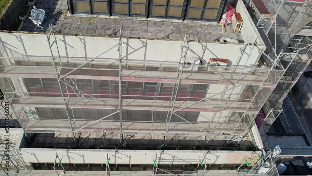 The facade of the Tall high-rise building under construction with ...
