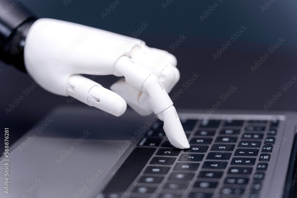Chat ai, artificial intelligence, robo advisor, robotic concept. Robot finger point to laptop ...