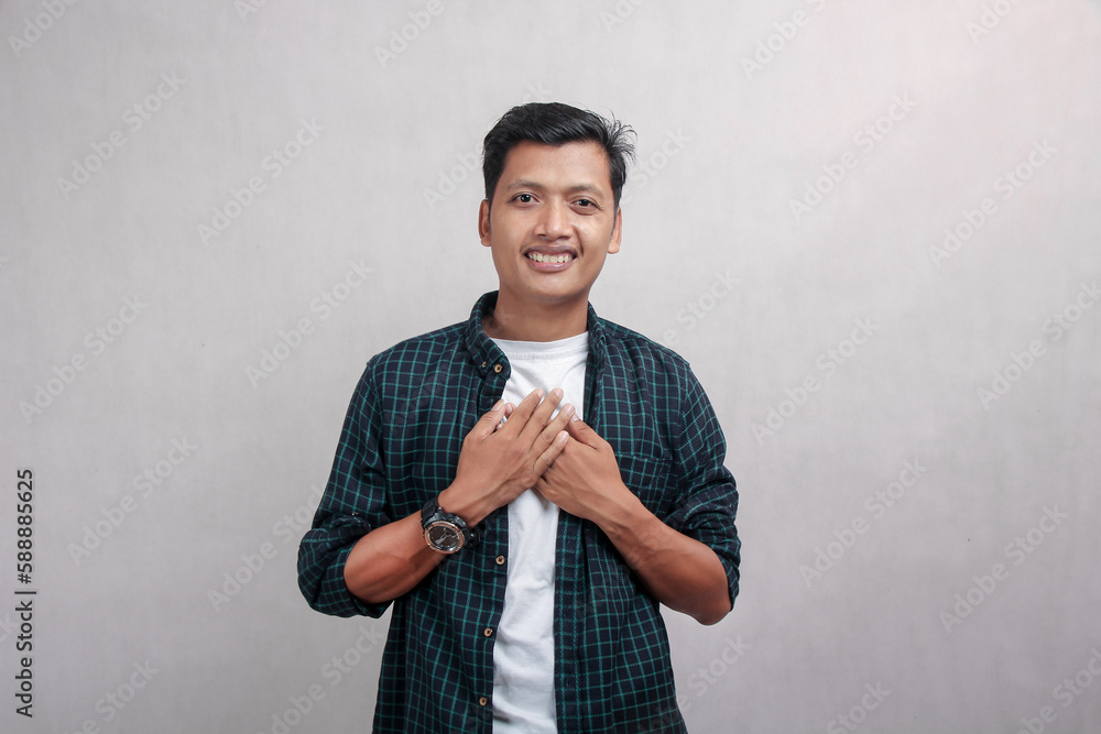 adult male green box showing gratitude gesture with his hand touching ...