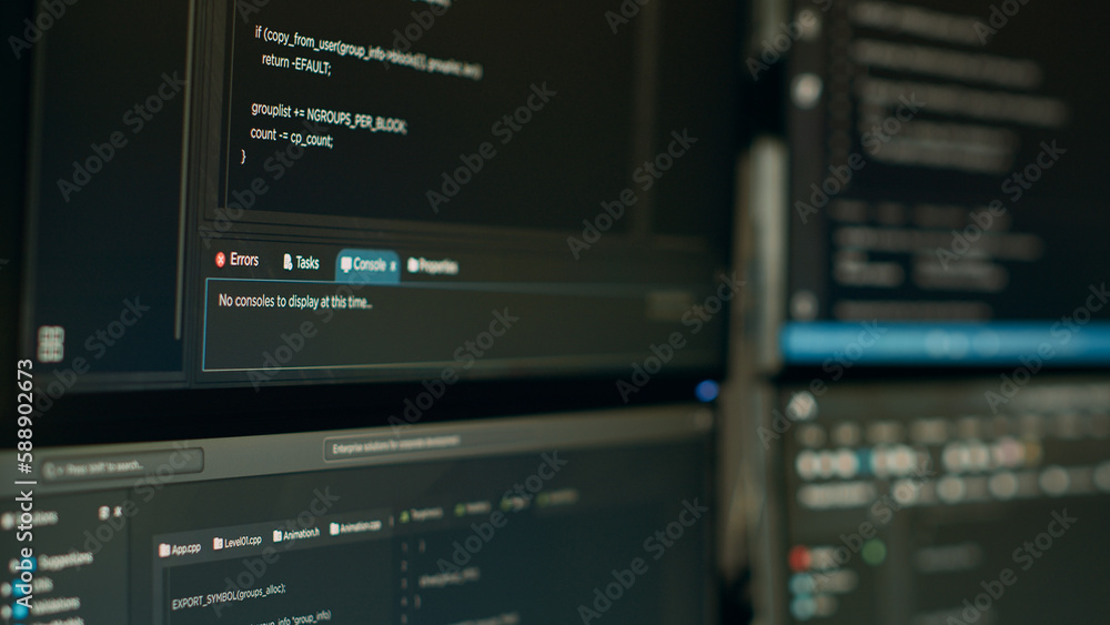 Computer screen of software developer typing programming language in it agency office. Display ...
