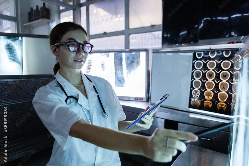 Doctor woman in medical laboratory at hospital. Anatomy diagnostic ...