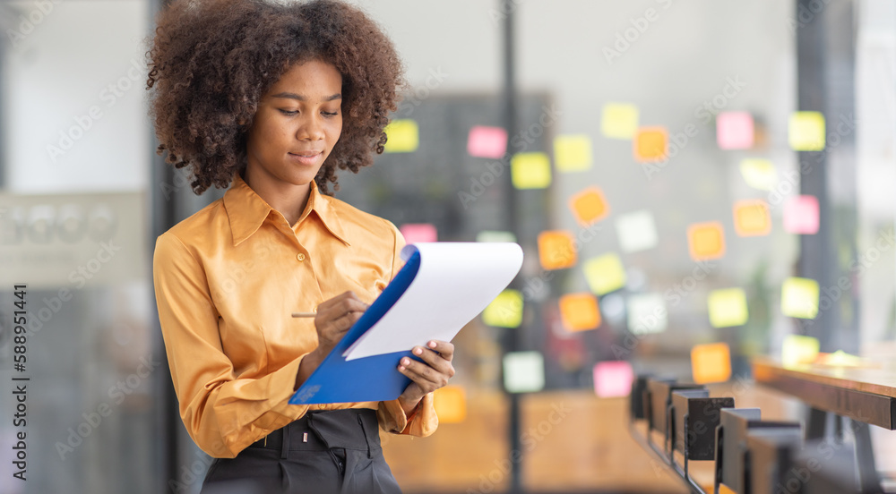 Young Asian woman Creative team use post it notes to share idea sticky ...