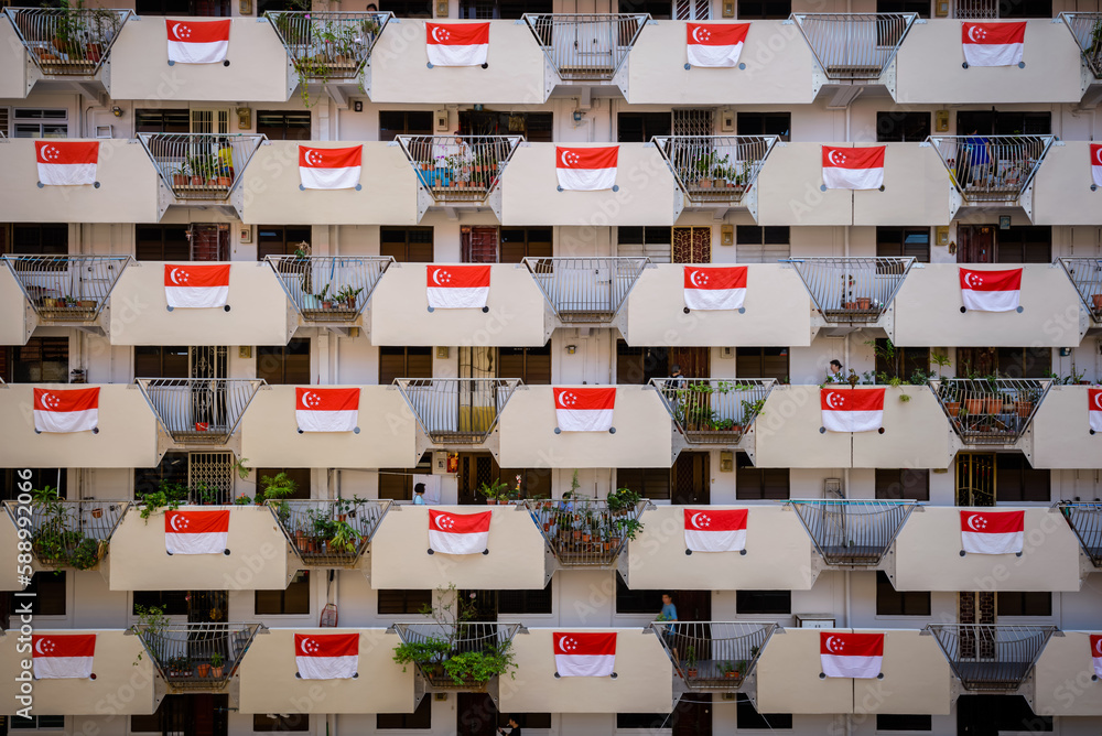 Singapore 2019 an apartment corridor with full flags for National Day ...