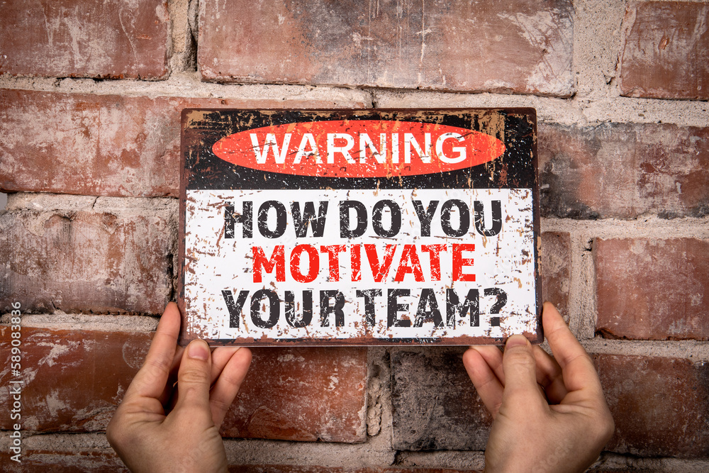 How Do You Motivate Your Team. Warning sign with text Stock Photo ...