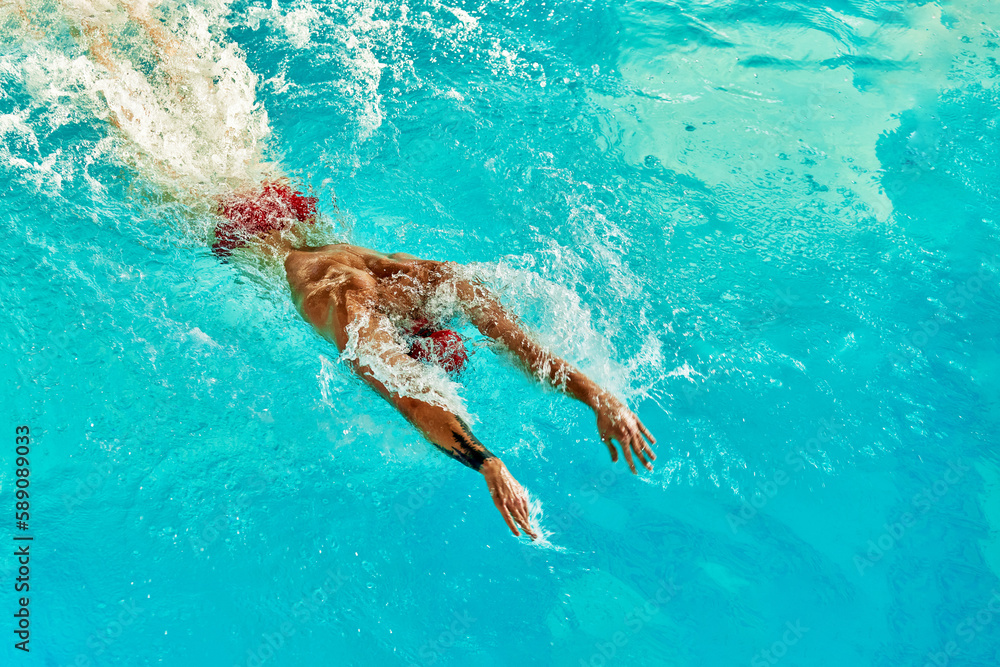 Aerial Top View Male Swimmer Swimming in Swimming Pool. Professional ...
